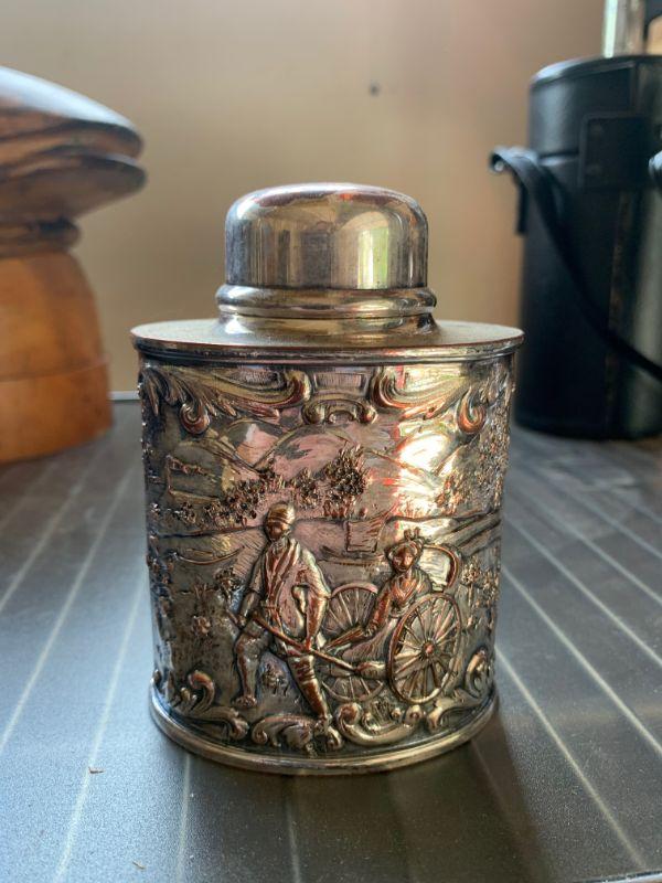 Embossed tobacco tin | EstateSales.org